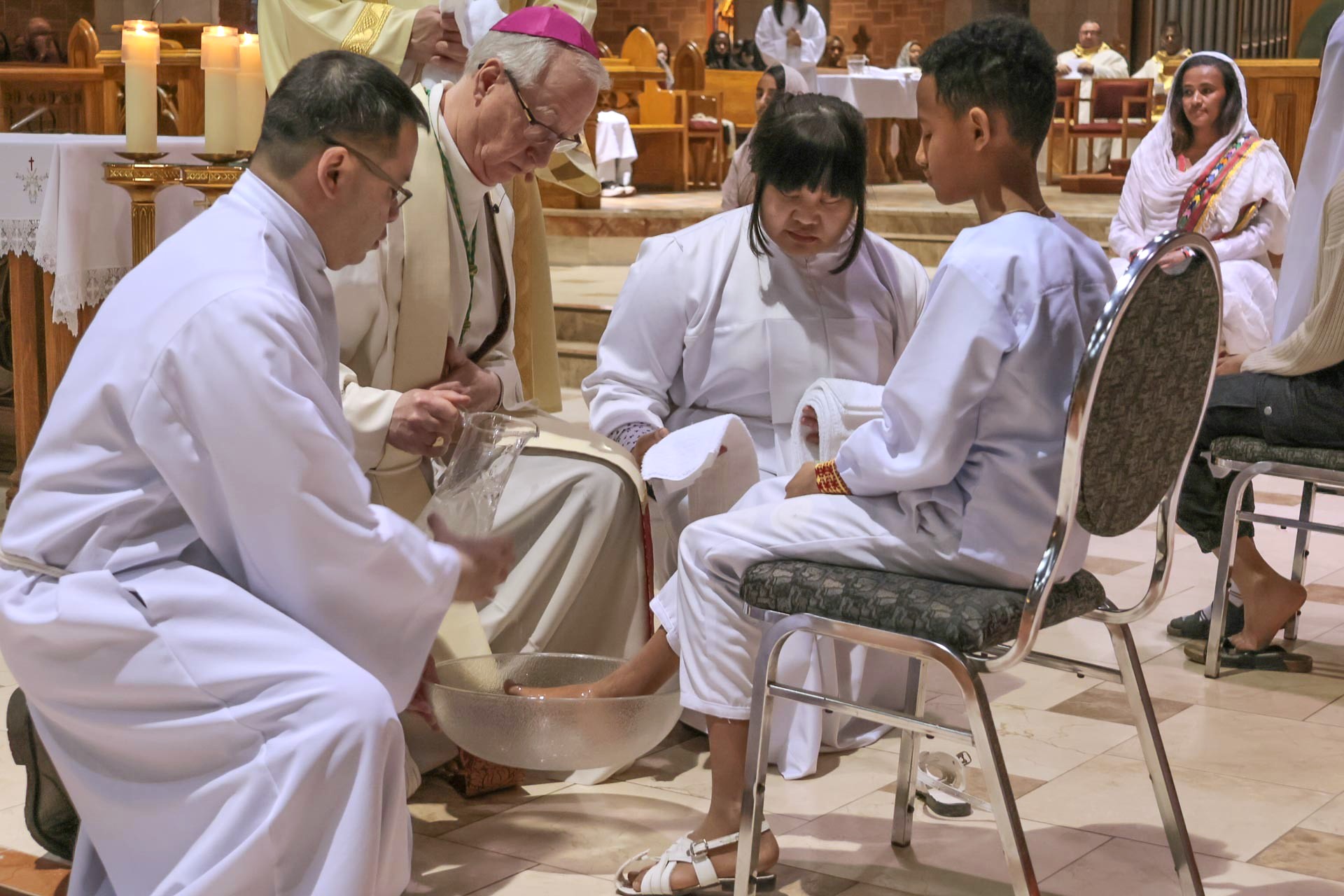 Archbishop Smith washes feet of Catholic Social Services community ...